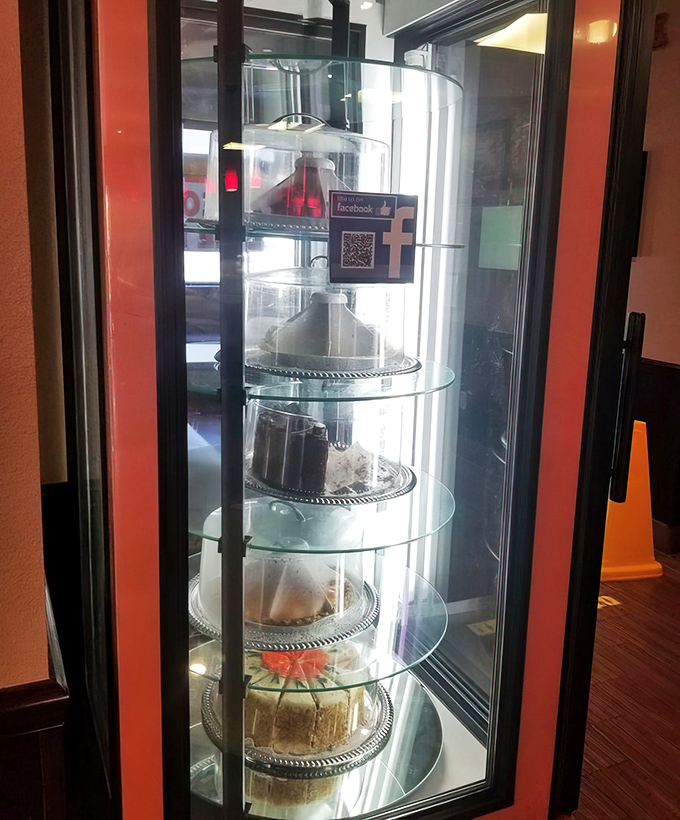 The dessert case &ndash; a glass-enclosed museum of temptation where willpower goes to die and "I'll just have a bite" becomes a beautiful lie.