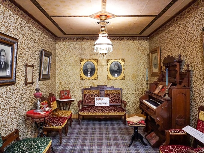 This Victorian parlor hasn't changed since your great-grandparents' courting days. That organ has witnessed more family drama than Thanksgiving dinner.