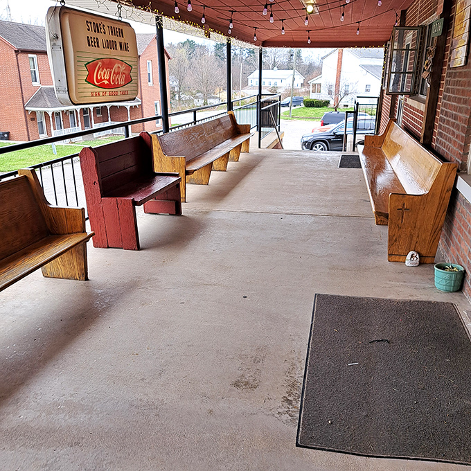 The front porch with its church pew seating&mdash;where patience is rewarded as you wait for a table on busy nights.