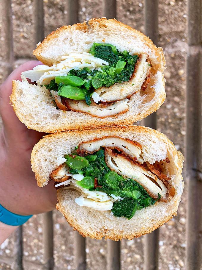 The chicken cutlet with broccoli rabe: a perfect marriage of crispy, savory, and slightly bitter that will haunt your dreams.