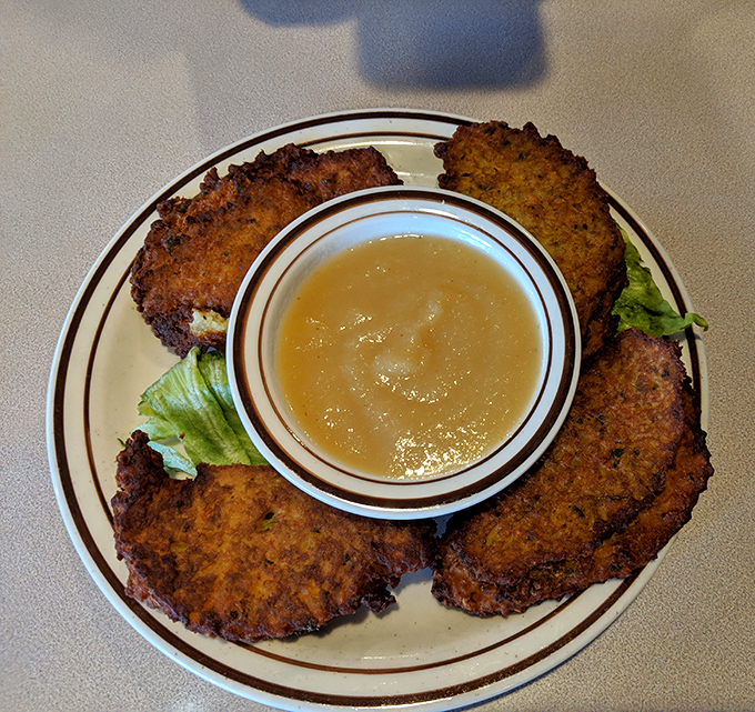 Potato pancakes with applesauce &ndash; where crispy exterior meets tender interior in a dance as old as time itself.