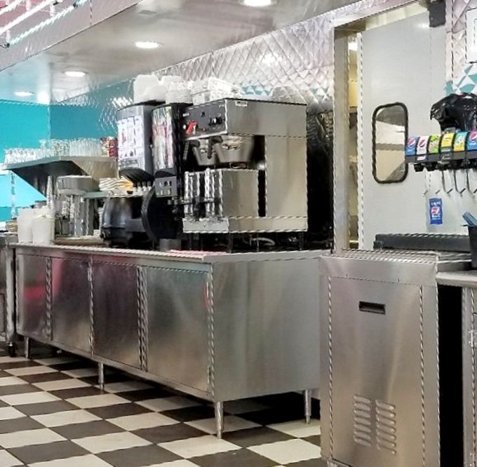 Behind the scenes, the gleaming prep area where diner magic happens, stainless steel workhorses ready for the next rush.