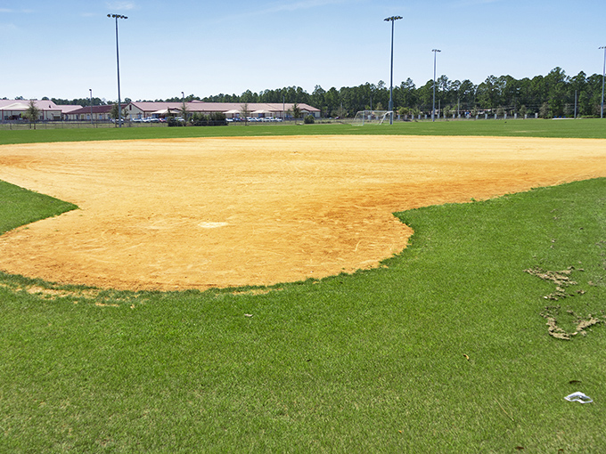 Perfectly maintained baseball diamonds await the crack of the bat – fields of dreams where retirement leagues and youth teams create multi-generational memories.