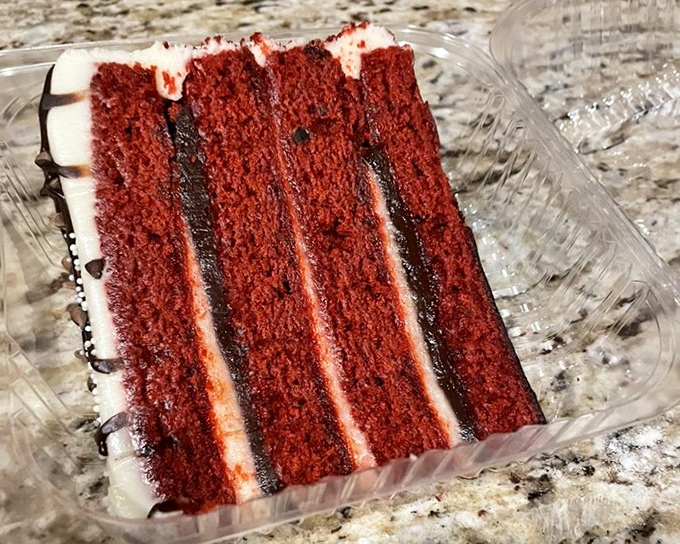 Red velvet cake with layers so perfect they belong in a geometry textbook &ndash; each bite a perfect balance of cake and cream cheese frosting.