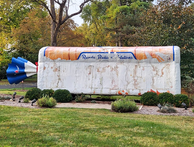 Even giant bread needs a facelift sometimes. This image captures the loaf during one of its restoration periods&mdash;proof that maintaining bread art is no simple task.
