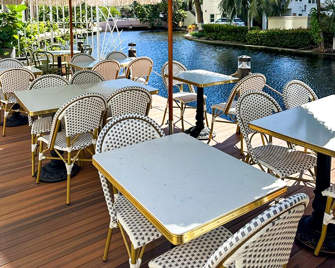 Waterfront dining that makes you question why all breakfasts don't come with a side of sparkling blue canal views.