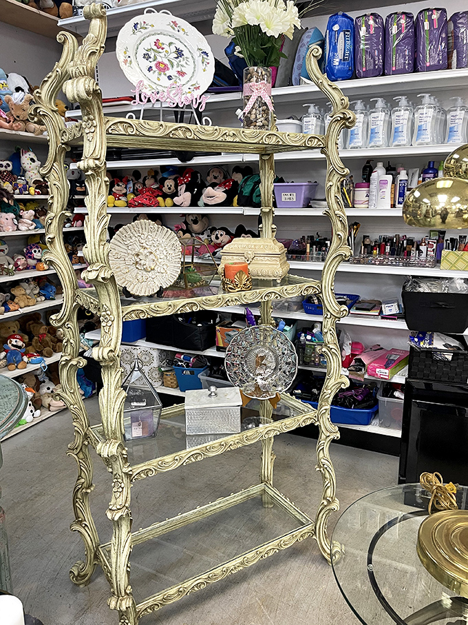 Rococo-oh-my-goodness! This ornate display shelf brings palatial elegance to any space, just waiting for your treasures to take the spotlight.
