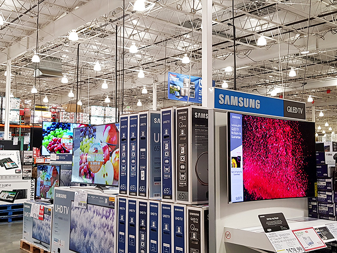 Samsung's latest technology dazzles visitors with screens bigger than most apartment living room walls.