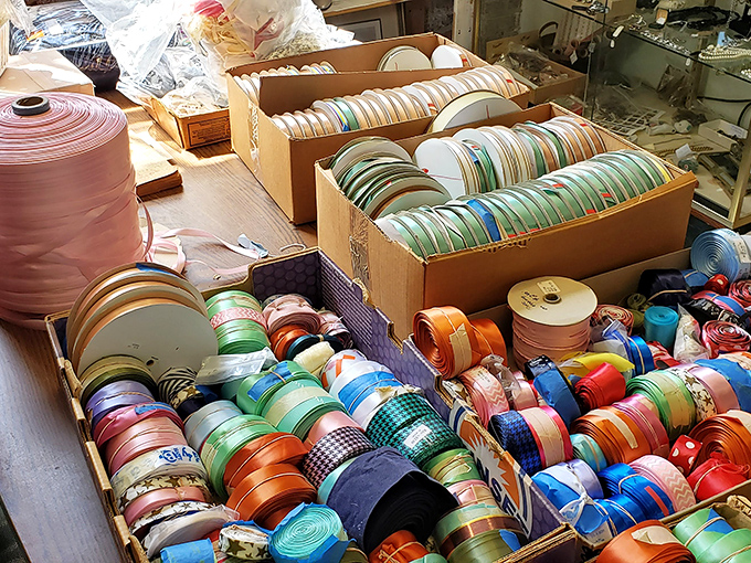 A ribbon collector's dream or a gift wrapper's heaven? Either way, this colorful chaos represents thousands of perfectly wrapped presents. 