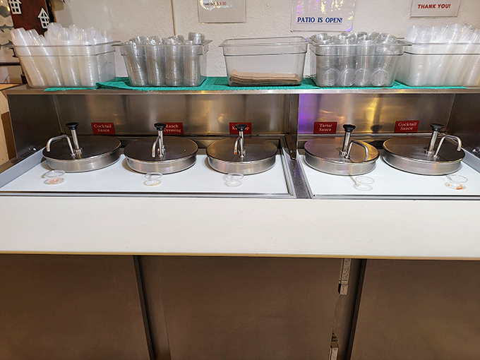 Sauce is serious business here. These pumps dispense liquid gold that transforms already delicious seafood into something worth writing home about.