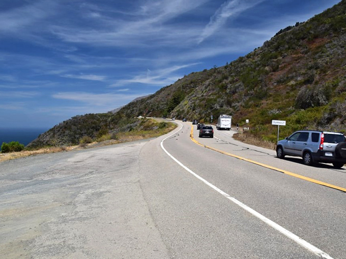 Every curve reveals another postcard moment. This stretch of road makes your car feel like a time machine to simpler, more beautiful days.