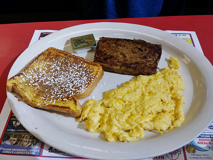 The holy trinity of Pennsylvania breakfast: scrambled eggs, scrapple, and French toast. A meal that sticks to your ribs and your memories.