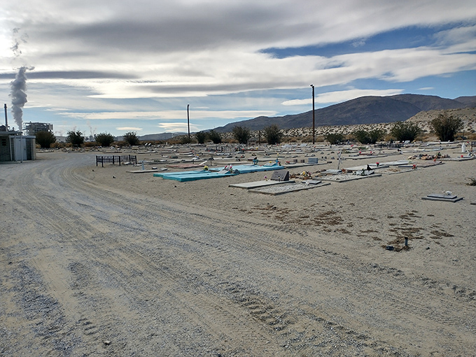 Final rest with a view—Trona's cemetery reflects the stark beauty of desert simplicity, where even memorials embrace the landscape's minimalist aesthetic.