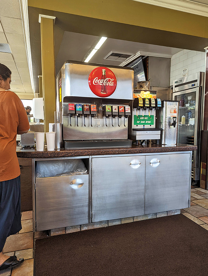 Even the beverage station maintains that authentic diner charm where fountain drinks taste like they're supposed to.