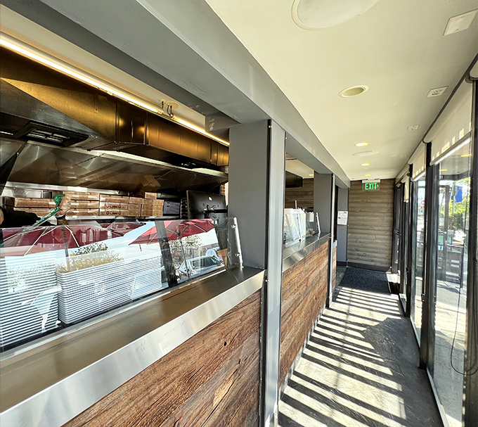 The sandwich assembly line where magic happens. Like watching artists at work, except you get to eat the masterpiece afterward.