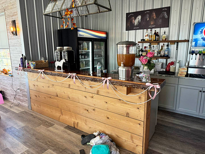 A bar counter adorned with delicate string lights and fresh flowers &ndash; where farm-to-glass beverages complement the farm-to-table philosophy.