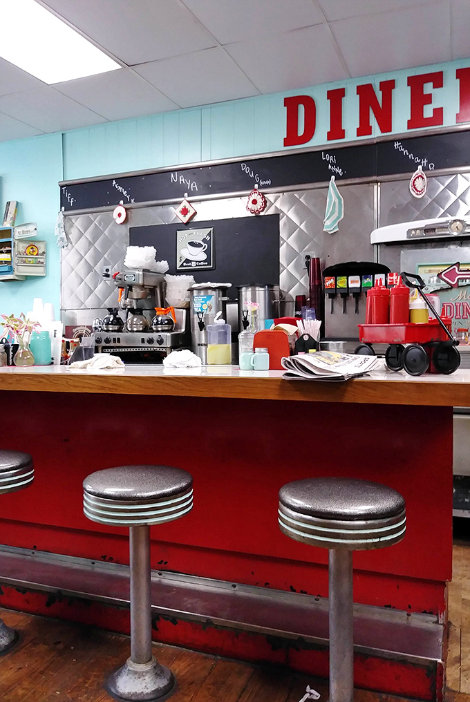 Classic counter seating where solo diners become regulars and regulars become family. Those chrome stools have heard a million stories.