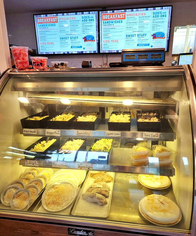 The deli case reveals a treasure trove of freshly prepared salads and homemade pies that make choosing just one an exercise in delicious indecision.