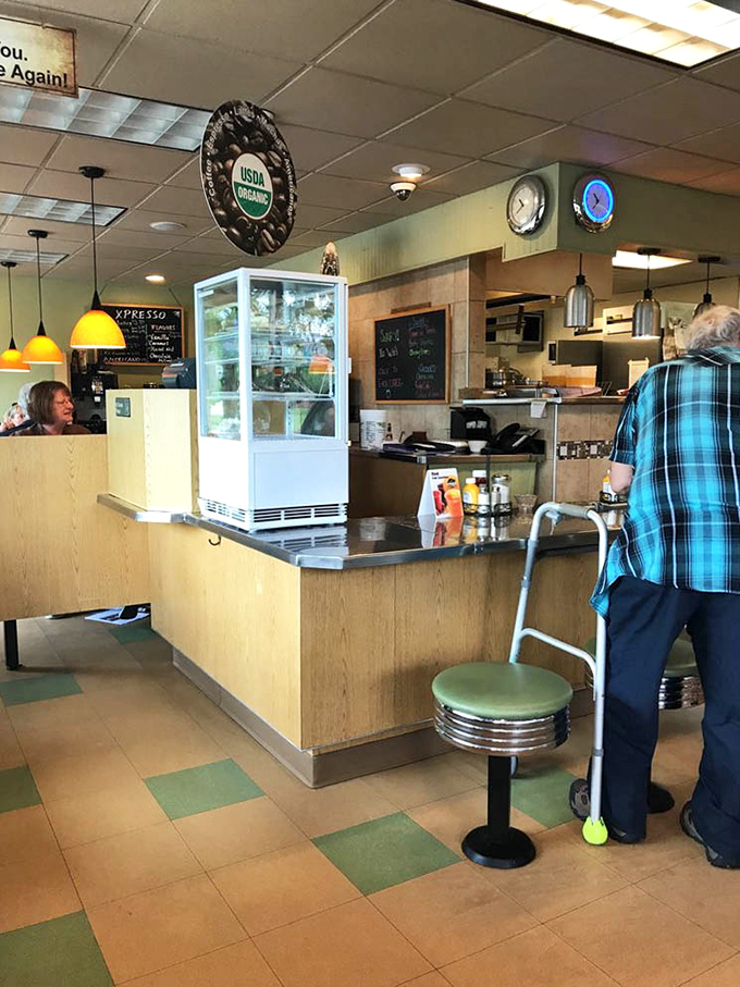 The efficient counter setup keeps coffee flowing and orders moving with impressive small-town hospitality precision.