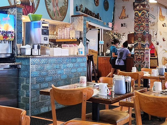 Blue tiles and wooden accents create the perfect backdrop for morning rituals&mdash;where servers transform coffee and conversation into the start of a perfect day.