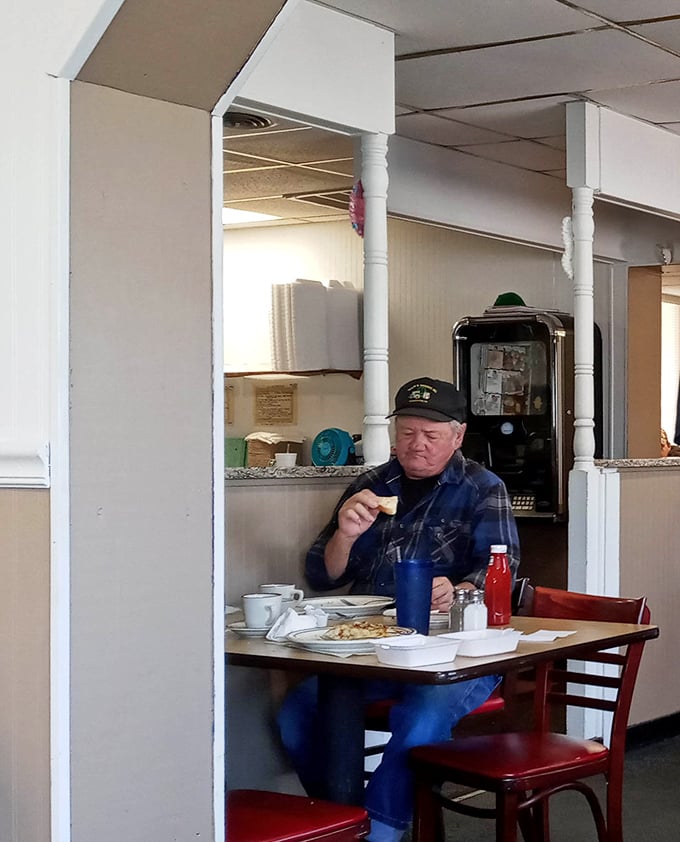 Even the ceiling fans seem to spin with contentment in this breakfast sanctuary.