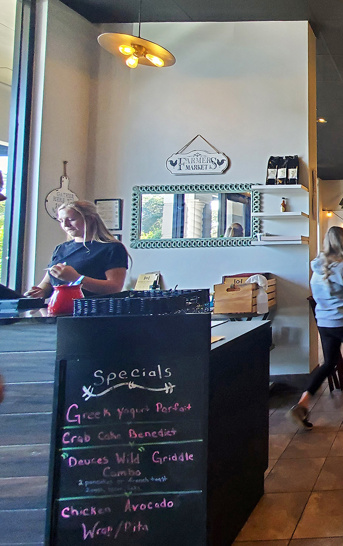 The hostess station stands ready to guide you to breakfast bliss, one table at a time.