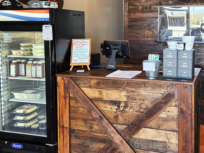 Rustic meets functional at this ordering counter. The reclaimed wood speaks to barbecue's humble roots while efficiently serving modern appetites.