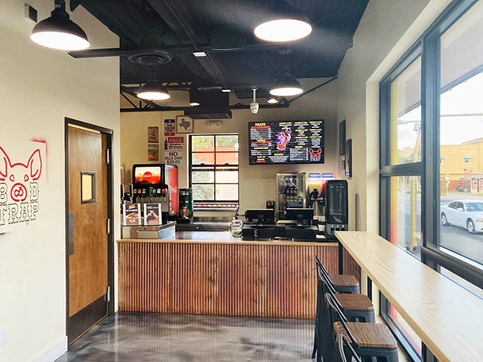 Clean lines, wood accents, and the promise of smoky delights. This counter has witnessed more food joy than a thousand birthday cakes.