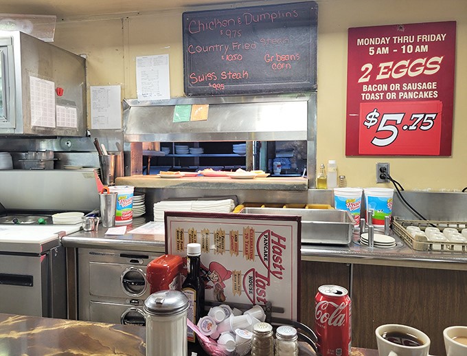 The kitchen pass&mdash;where breakfast dreams materialize under the watchful eyes of cooks who've flipped more eggs than most people have had hot meals.