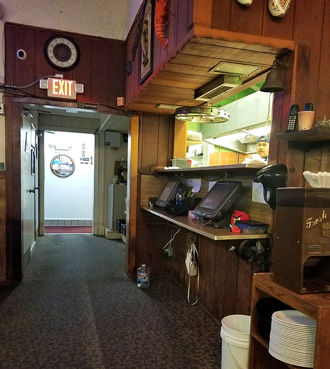 Behind-the-scenes glimpse of where all that crispy, golden magic happens with professional kitchen precision.