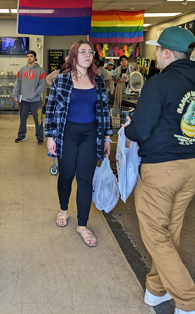 The store buzzes with shoppers hunting for their next great find. Under rainbow flags, treasure-seekers navigate aisles with the focus of archaeologists.