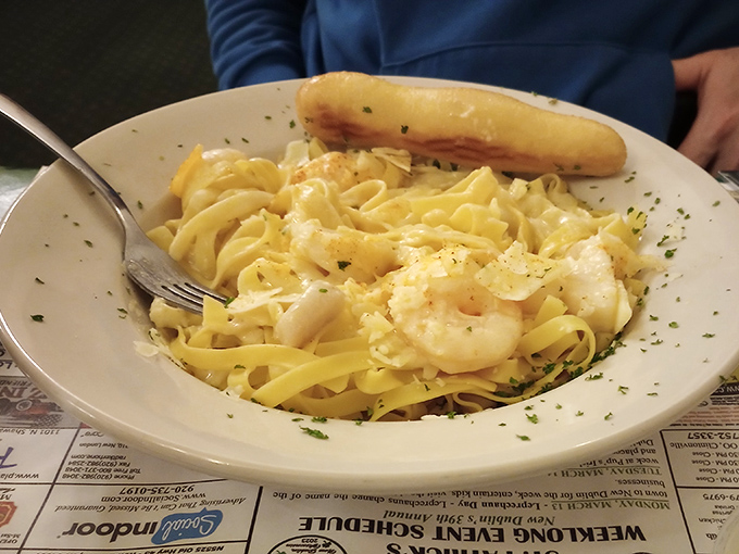 Shrimp and pasta living their best lives together in a creamy sauce that would make an Italian grandmother nod in reluctant approval.