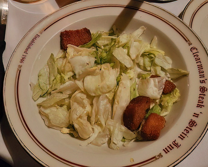 Even the side salad gets the royal treatment with fresh greens and thoughtful preparation.