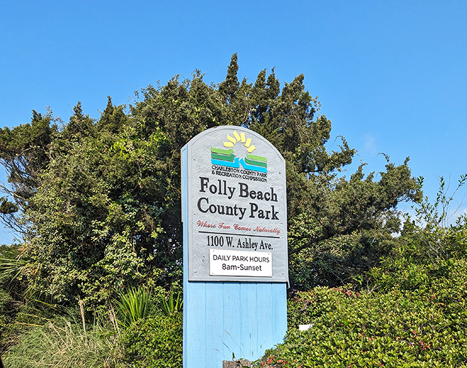"Where fun comes naturally" isn't just a slogan. Folly Beach County Park's welcoming sign promises&mdash;and delivers&mdash;coastal memories since 8am daily.