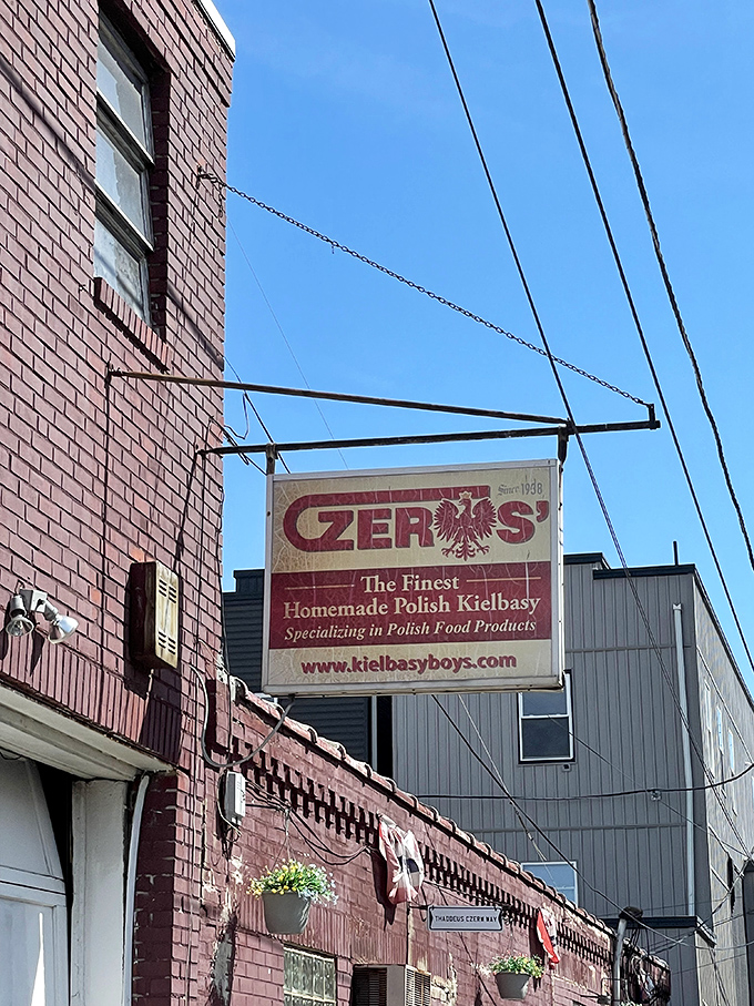 The sign swinging above Tilton Street&mdash;a beacon for those seeking authentic Polish flavors in Philadelphia's Port Richmond neighborhood. 
