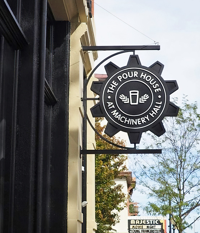 The gear-shaped sign announces your arrival at flavor headquarters. This isn't just a logo&mdash;it's a promise of mechanical precision in culinary form.