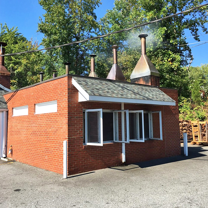The smokehouse&mdash;where the real magic happens. Those chimneys are basically barbecue lighthouses, guiding hungry souls to pork perfection.