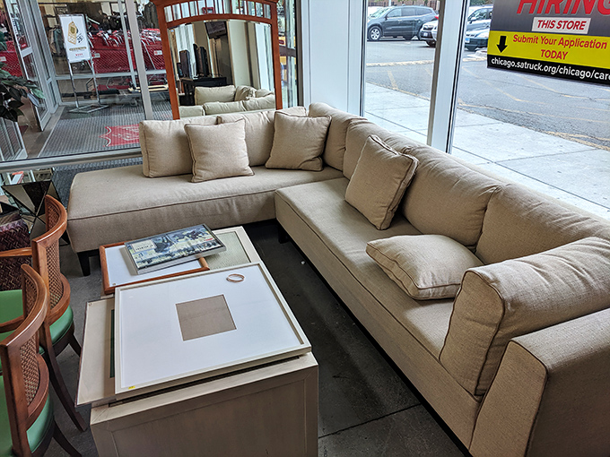 This neutral sectional sofa sits by the entrance, silently asking, "Could I be the missing piece in your living room puzzle?"