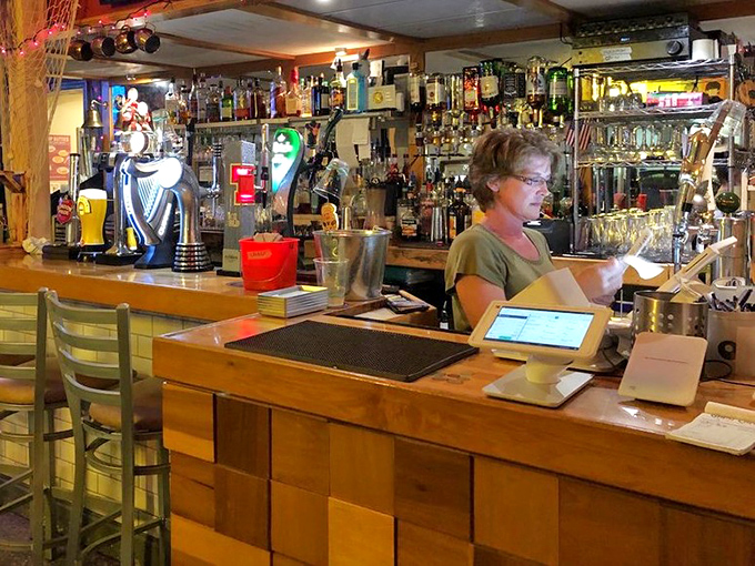 Behind the bar, where liquid dreams come true. More taps than a dance recital and enough spirits to raise yours.