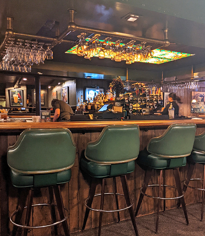 The bar's vintage green chairs have likely heard thousands of "best steak I've ever had" declarations over the years.