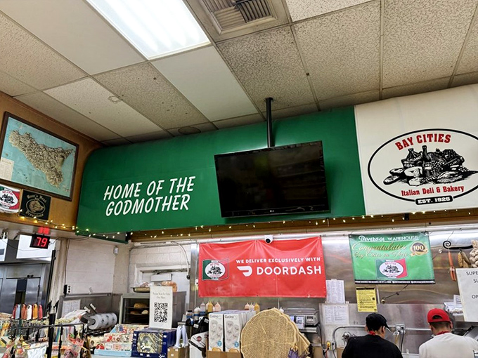 The sign proudly declares "HOME OF THE GODMOTHER" for good reason. It's not just a sandwich&mdash;it's a Santa Monica institution.