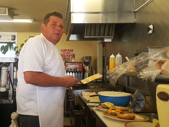 Behind every great diner is someone who knows exactly how that grill should sound when breakfast hits it just right.