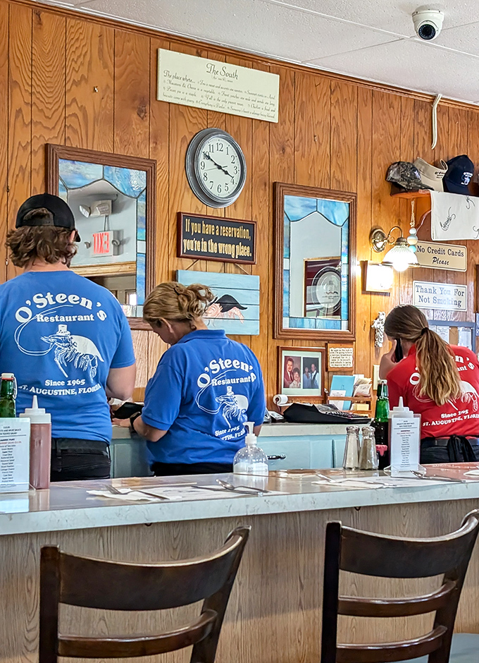 Staff sporting those iconic blue shirts &ndash; the unofficial uniform of people who know their seafood better than most know their passwords.