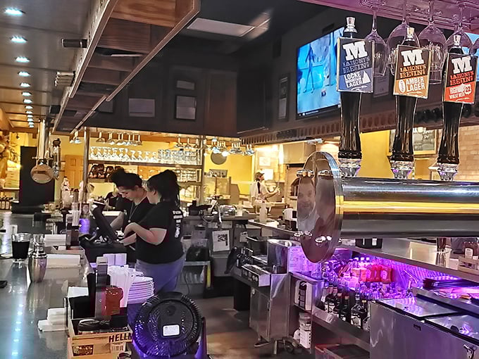 The outdoor patio where summer evenings stretch into memory. That brewing tank isn't just functional&mdash;it's a monument to good times and great beer.