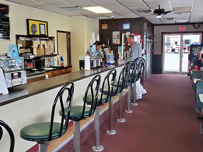 The counter seats: where solo diners become part of the Midway family and servers remember how you like your coffee.