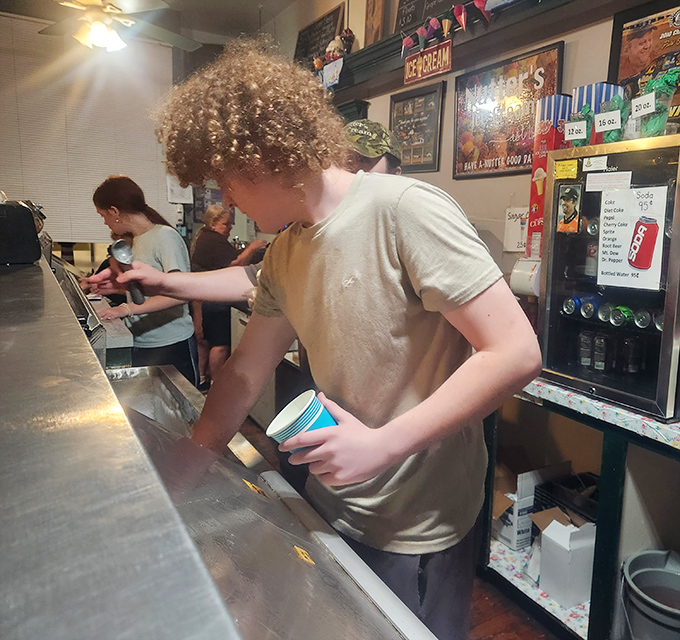 The unassuming exterior hides a wonderland of frozen delights. Like finding Narnia, but with waffle cones instead of wardrobes.