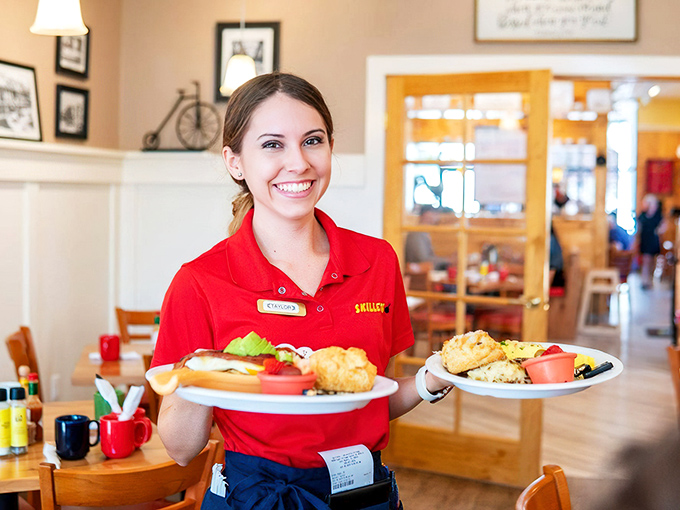 Service with a genuine smile makes everything taste better. Those plates look like they're headed for a very happy table.