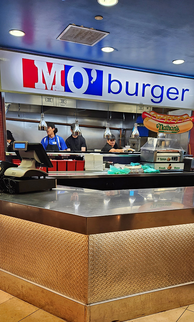 The hotel lobby's soaring ceilings and jewel-toned furniture create a luxurious pause between shopping expeditions, proving Wind Creek understands retail therapy requires actual therapy breaks.