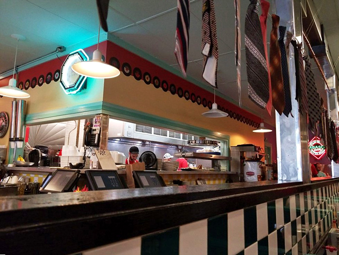 The open kitchen design lets you watch the culinary magic happen, where short-order wizards transform simple ingredients into plates of pure satisfaction.