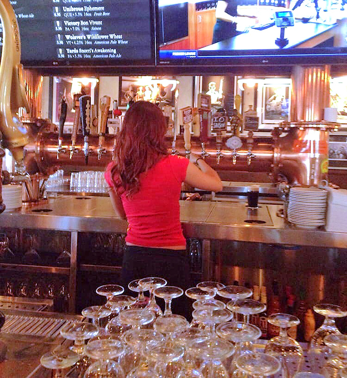 Behind the bar, the magic happens. Those taps aren't just dispensing beer; they're pouring liquid happiness to complement your oyster experience.